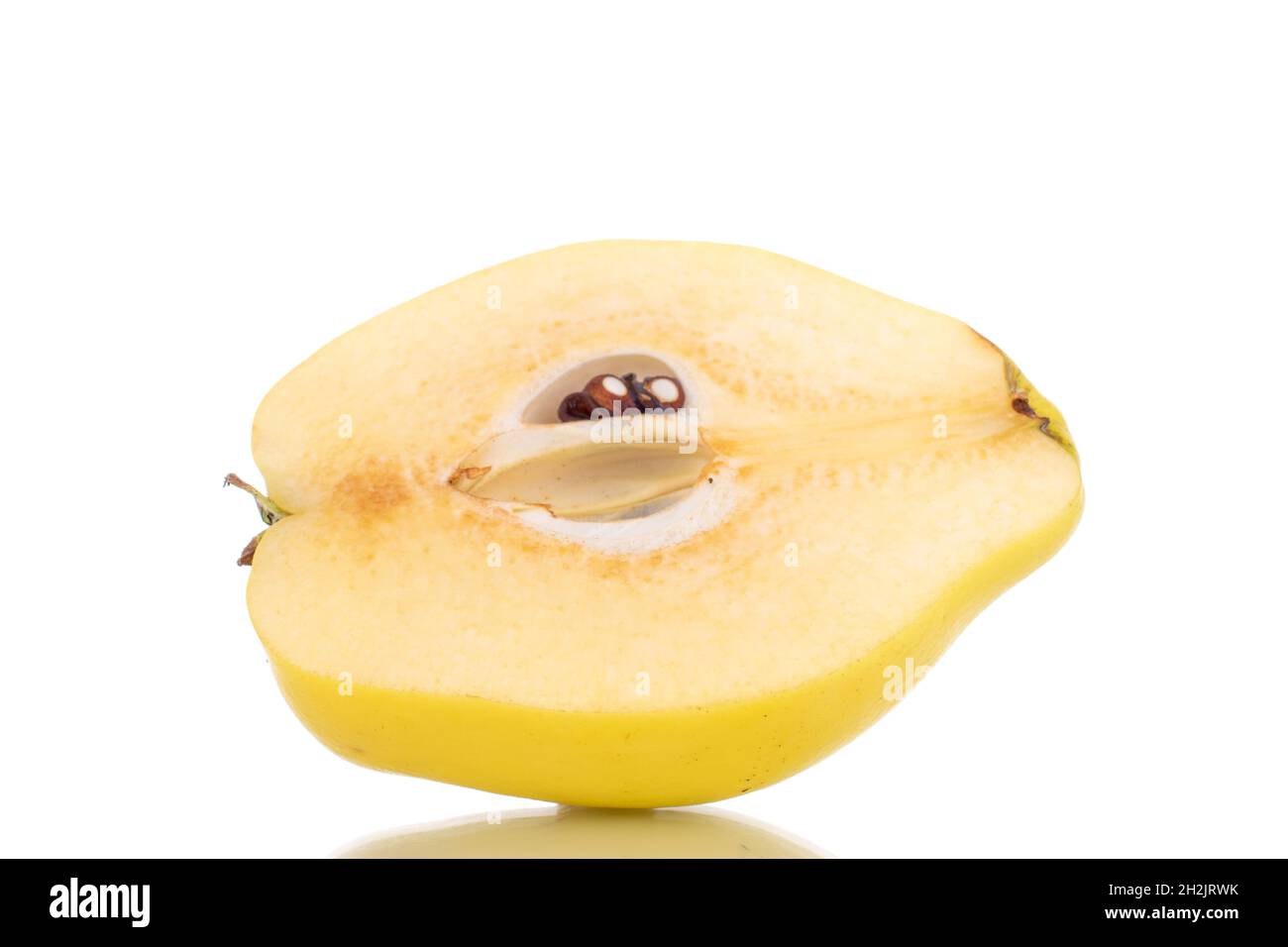 One half of ripe organic quince, close-up isolated on white Stock Photo ...