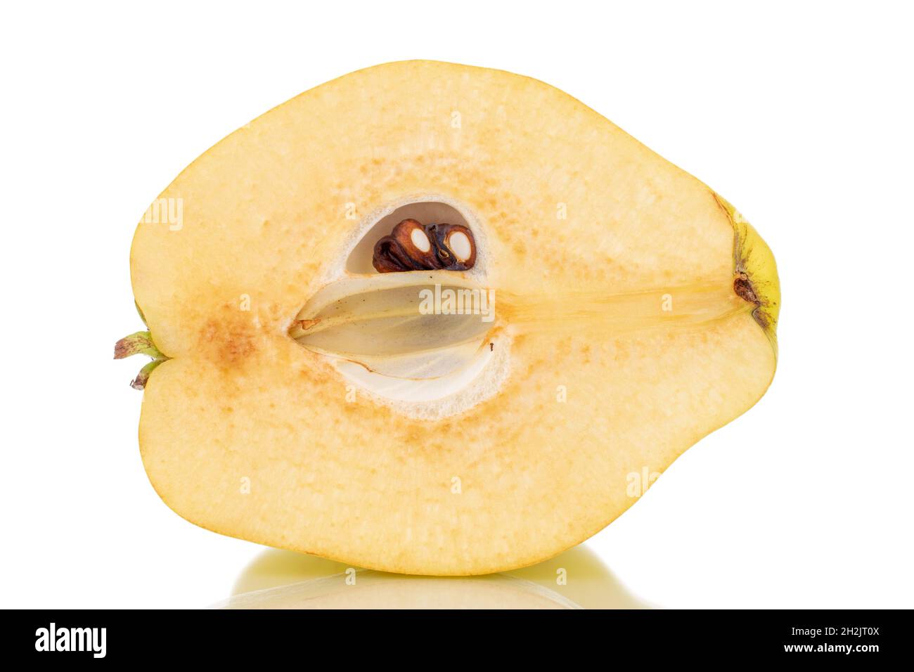 One half of ripe organic quince, close-up isolated on white Stock Photo ...