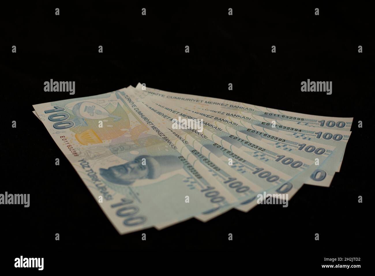 paper turkish lira on black background Stock Photo - Alamy