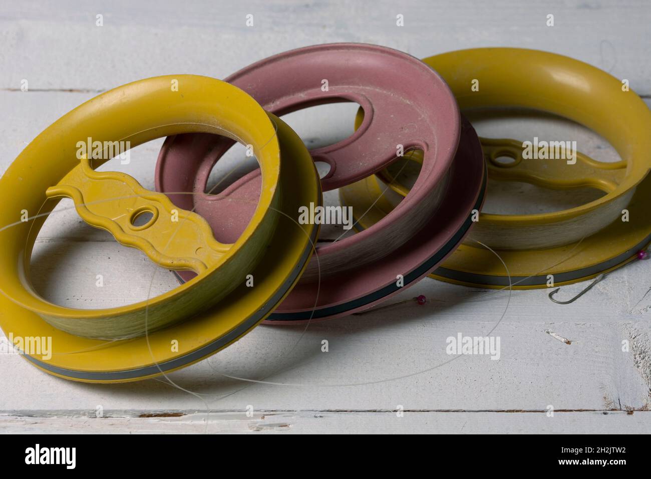 colorful fishing reel Stock Photo - Alamy