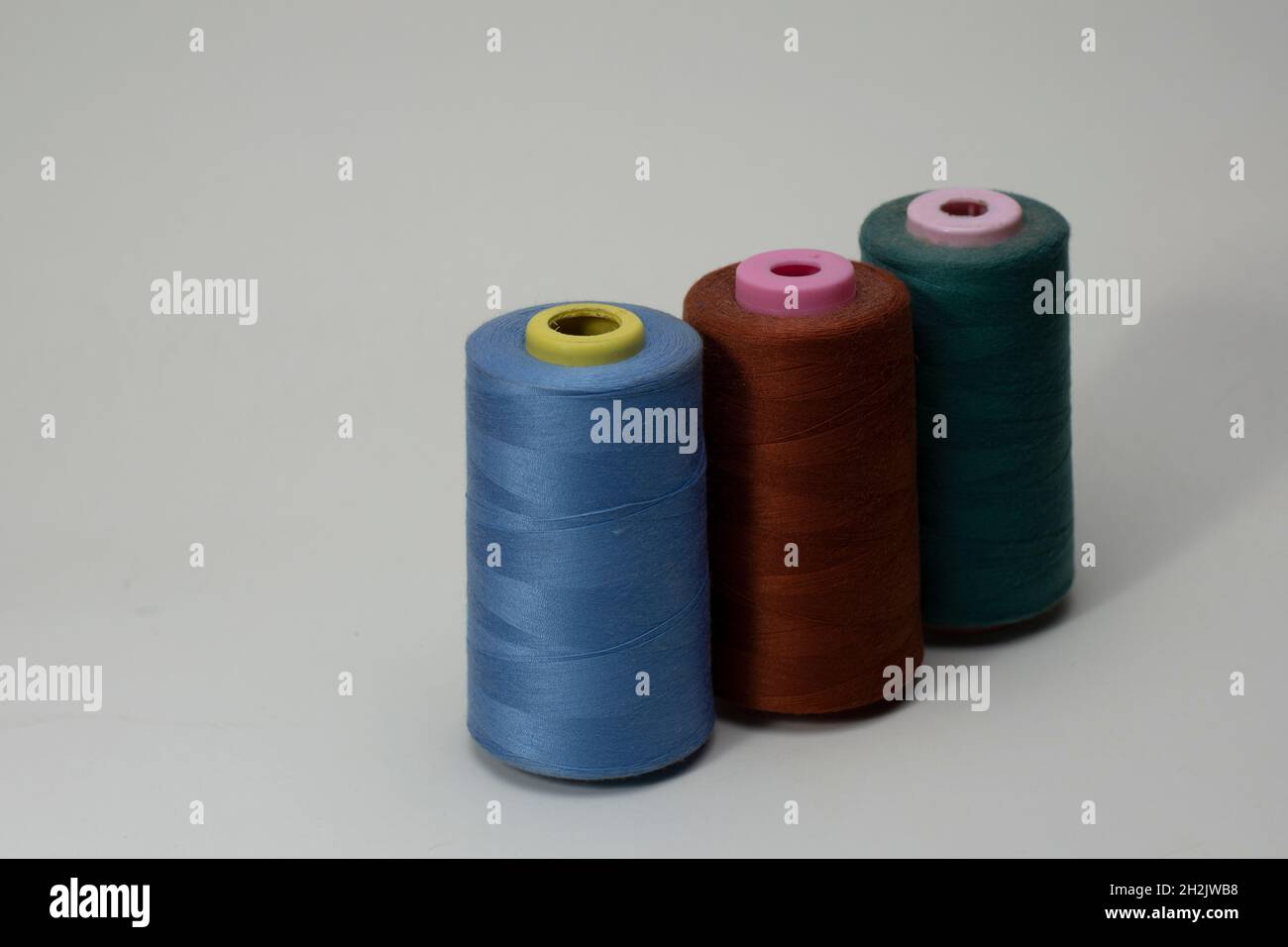 Two thread spools on hi-res stock photography and images - Alamy