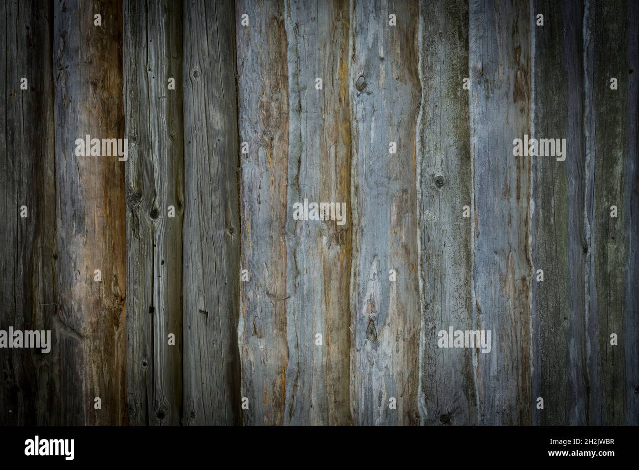 Wooden logs of an old house. Weathered natural gray wood texture ...