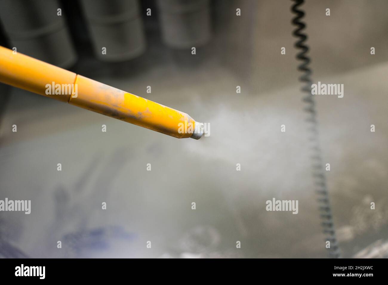 Powder coating gun tip Stock Photo - Alamy