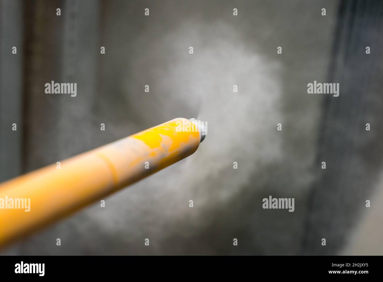 Powder coating gun tip Stock Photo - Alamy