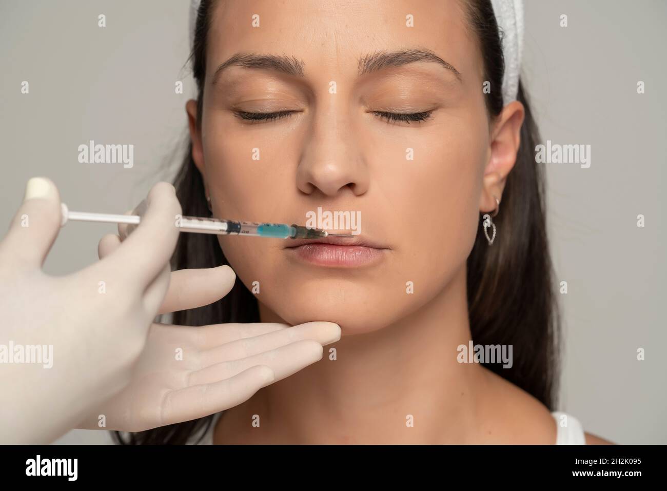 Woman injections face hi-res stock photography and images - Alamy
