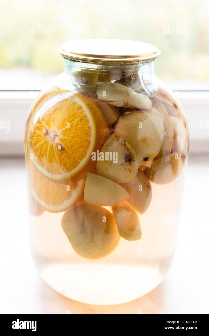 3 liter glass jar with homemade kompot (stewed fruit) made from sliced ...