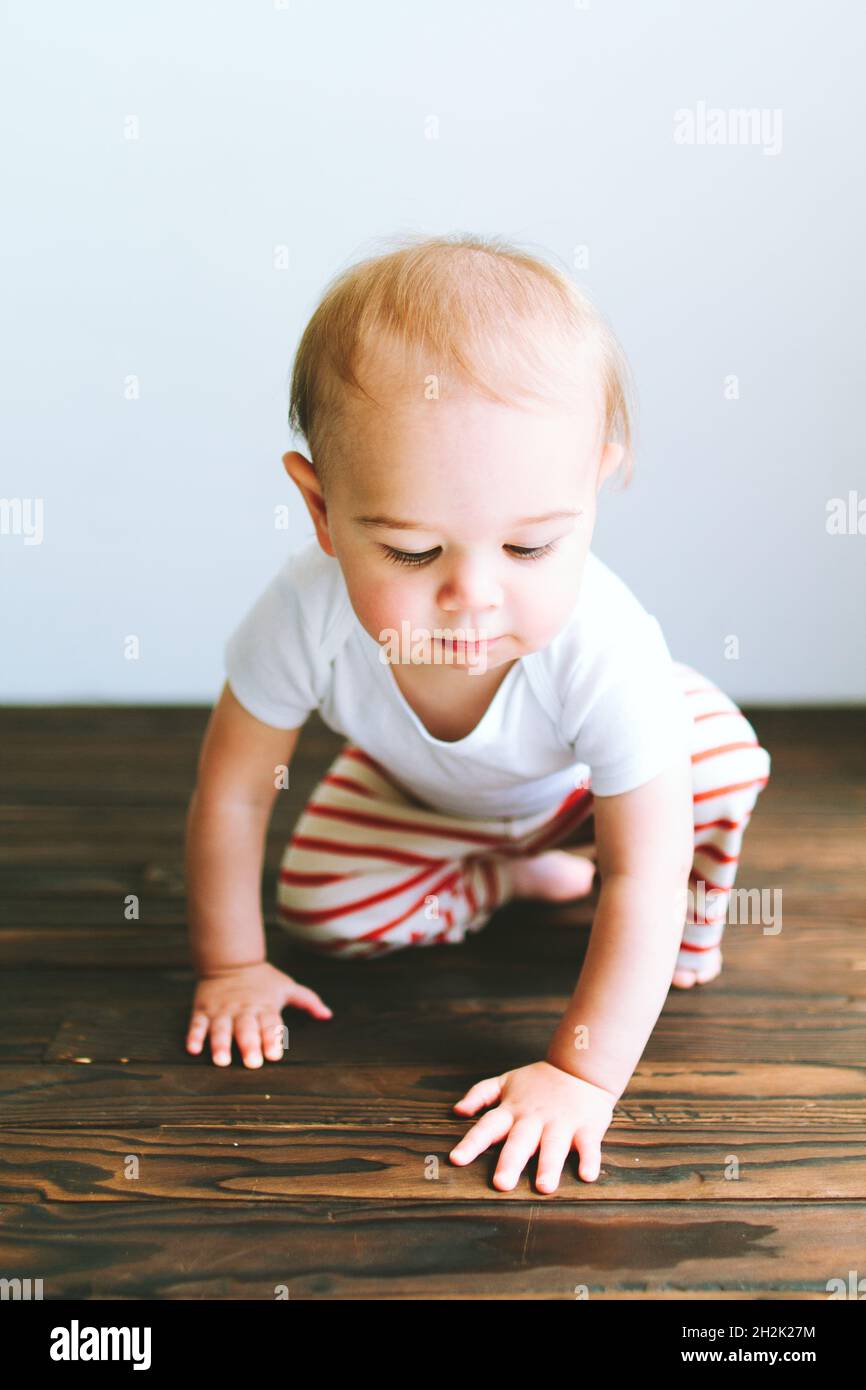Closeup of a baby boy looking down Stock Photo - Alamy