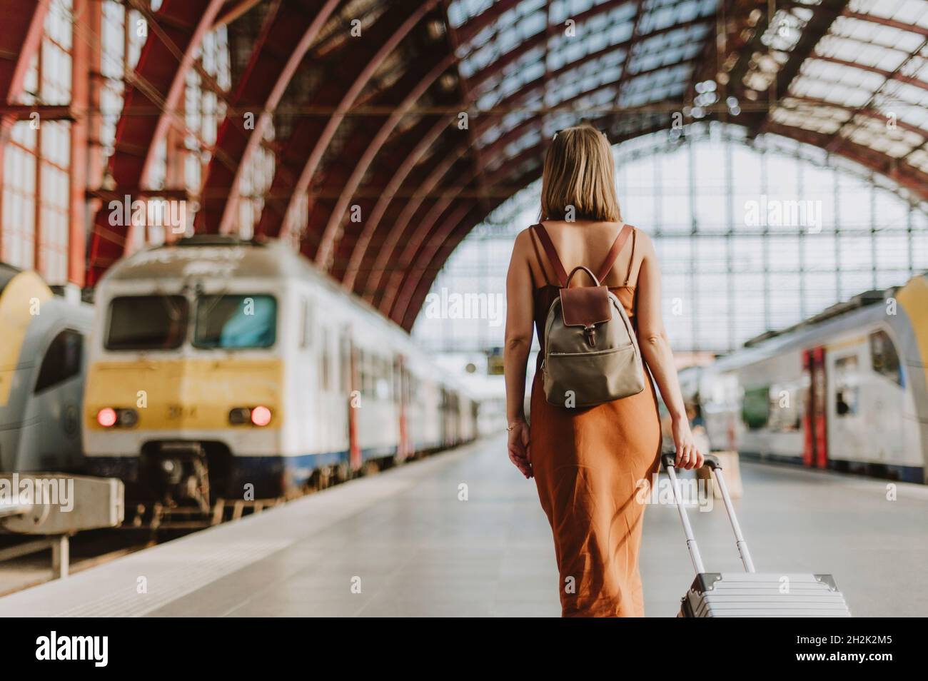 Tourist woman walking inside the train station in Antwerp Stock Photo ...