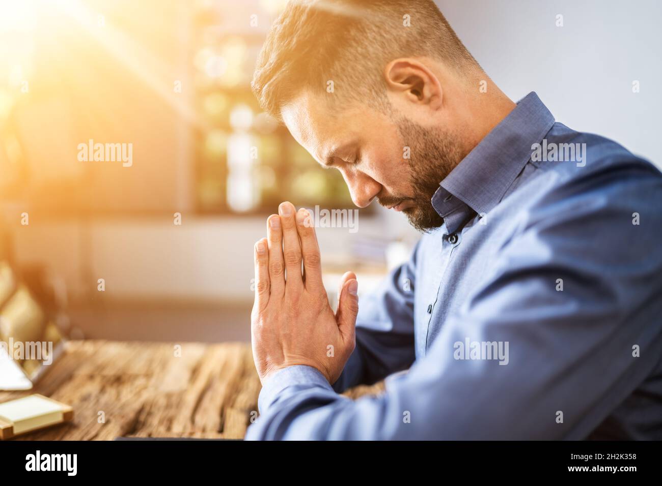 Praying Man. Christian Prayer Seeking God In Living Room Stock Photo ...