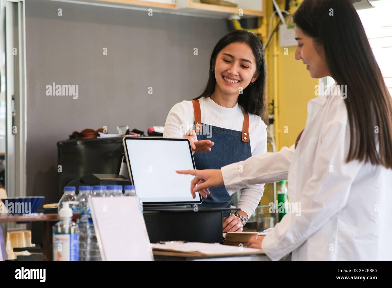 Customer self service order drink menu with tablet screen at cafe ...