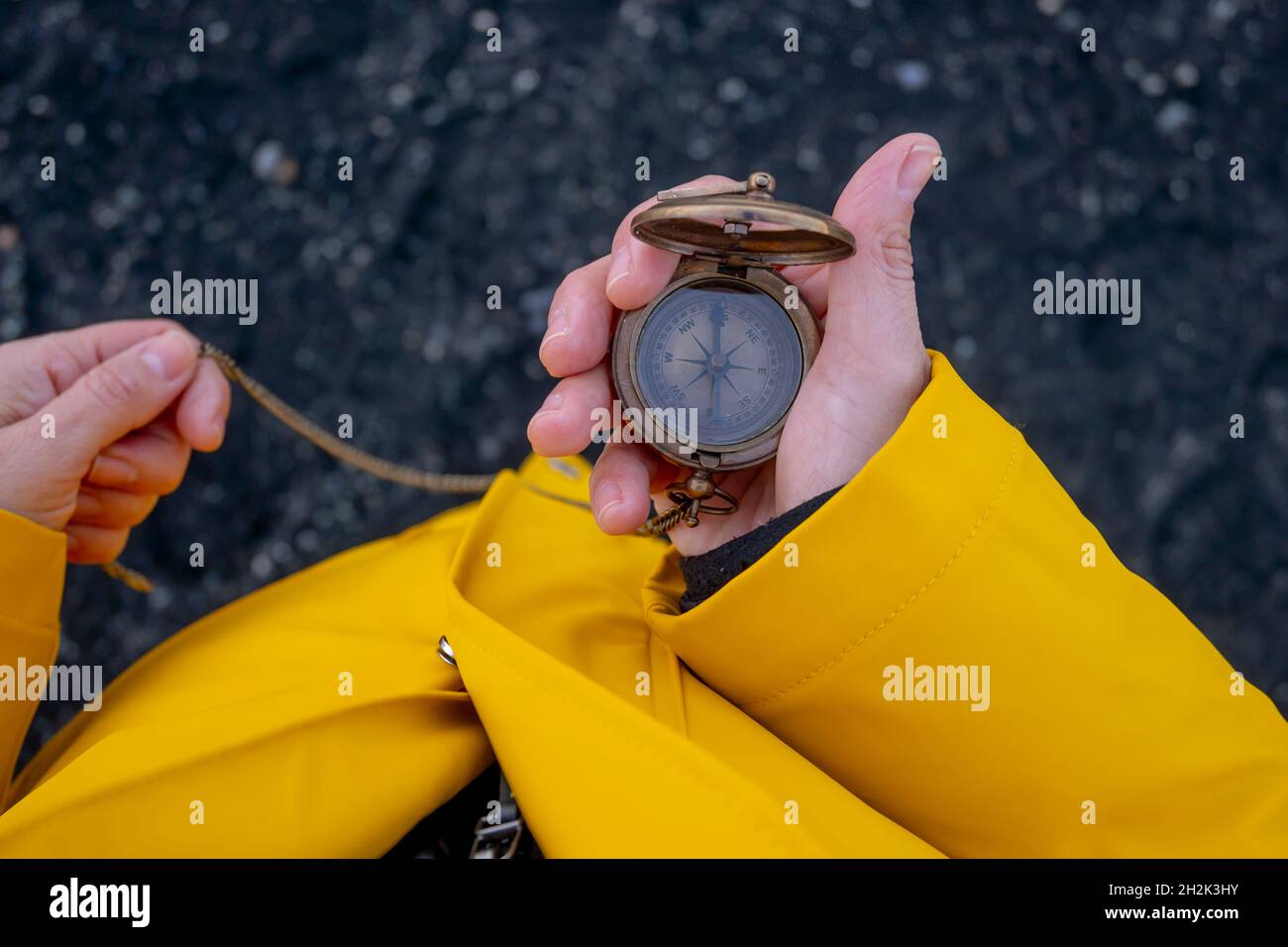 Female hand holding compass hi-res stock photography and images - Alamy