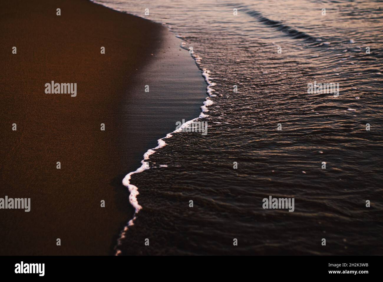 Sea weave brown sunset water Stock Photo - Alamy
