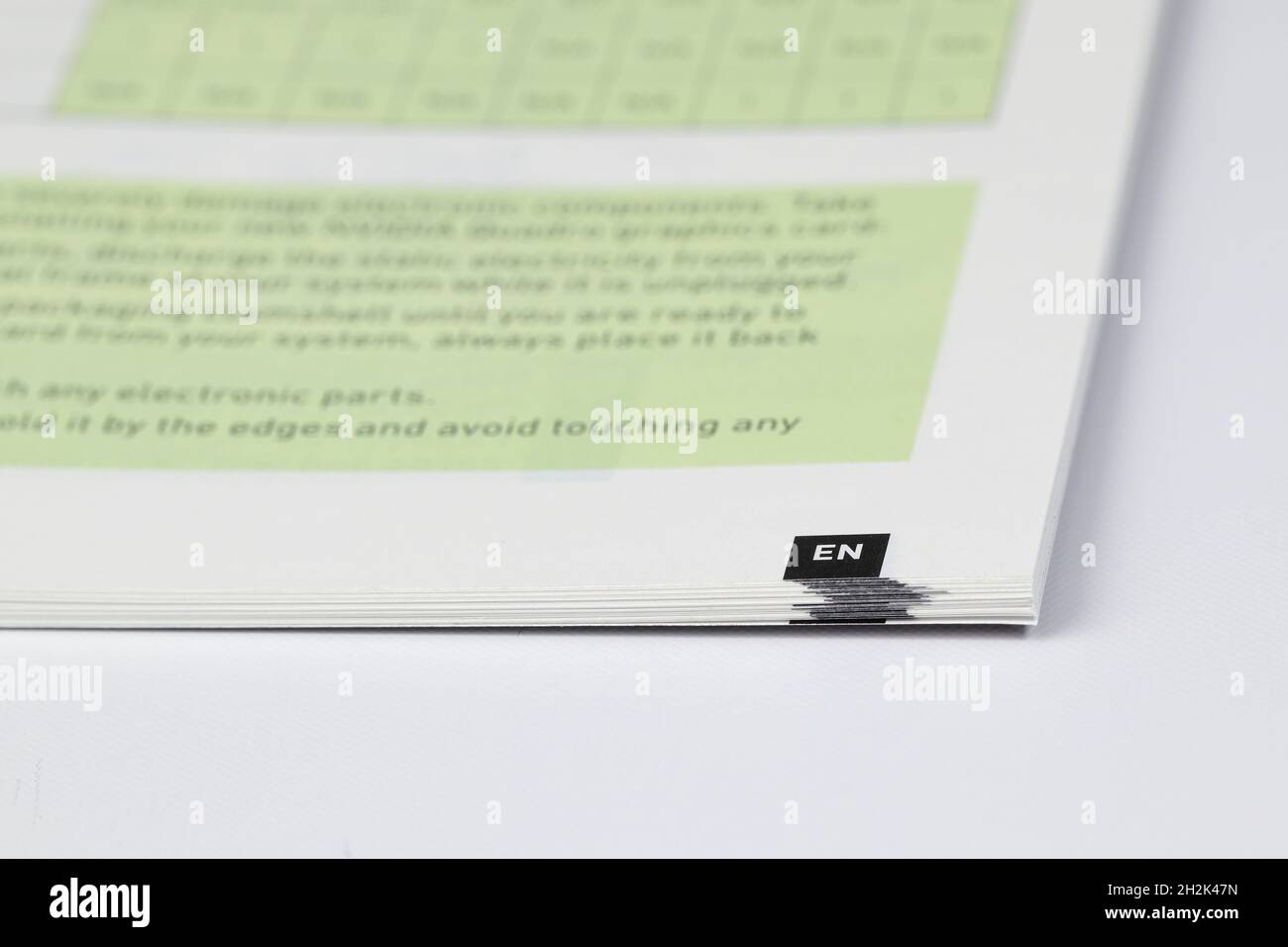 Close-up Of language index on multilingual book or user manual with ...