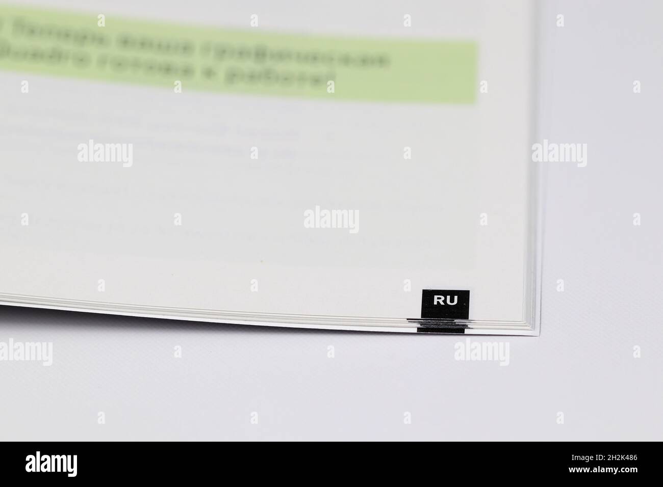 Close-up Of language index on multilingual book or user manual with ...