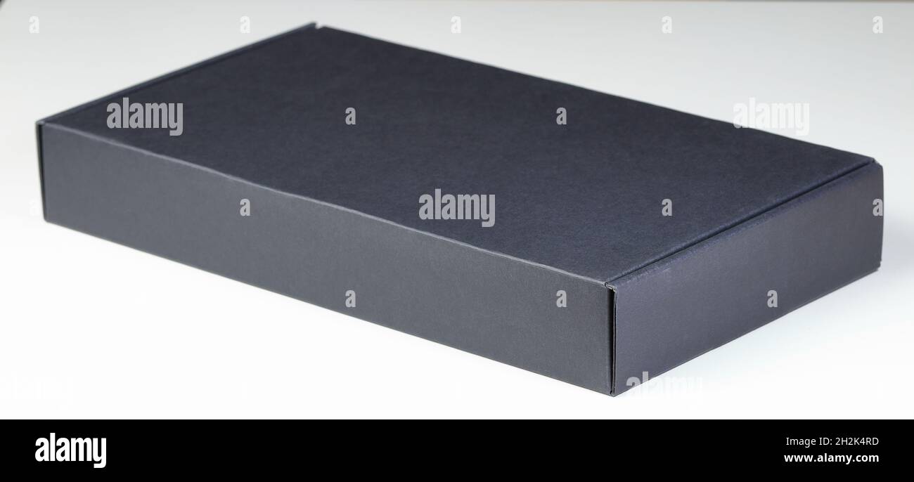 Black Square Cardboard box for Parcel Delivery isolated on white ...