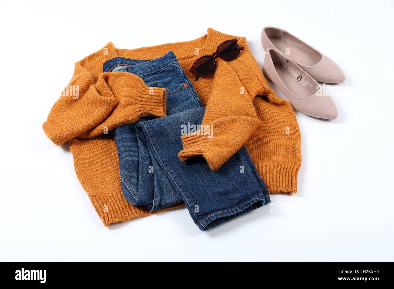 Autumn style female clothes on white background Stock Photo - Alamy