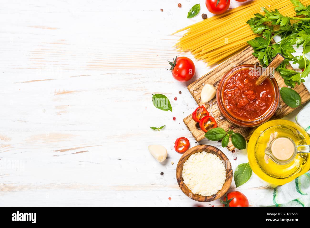 Italian food background at white bkitchen table Stock Photo - Alamy