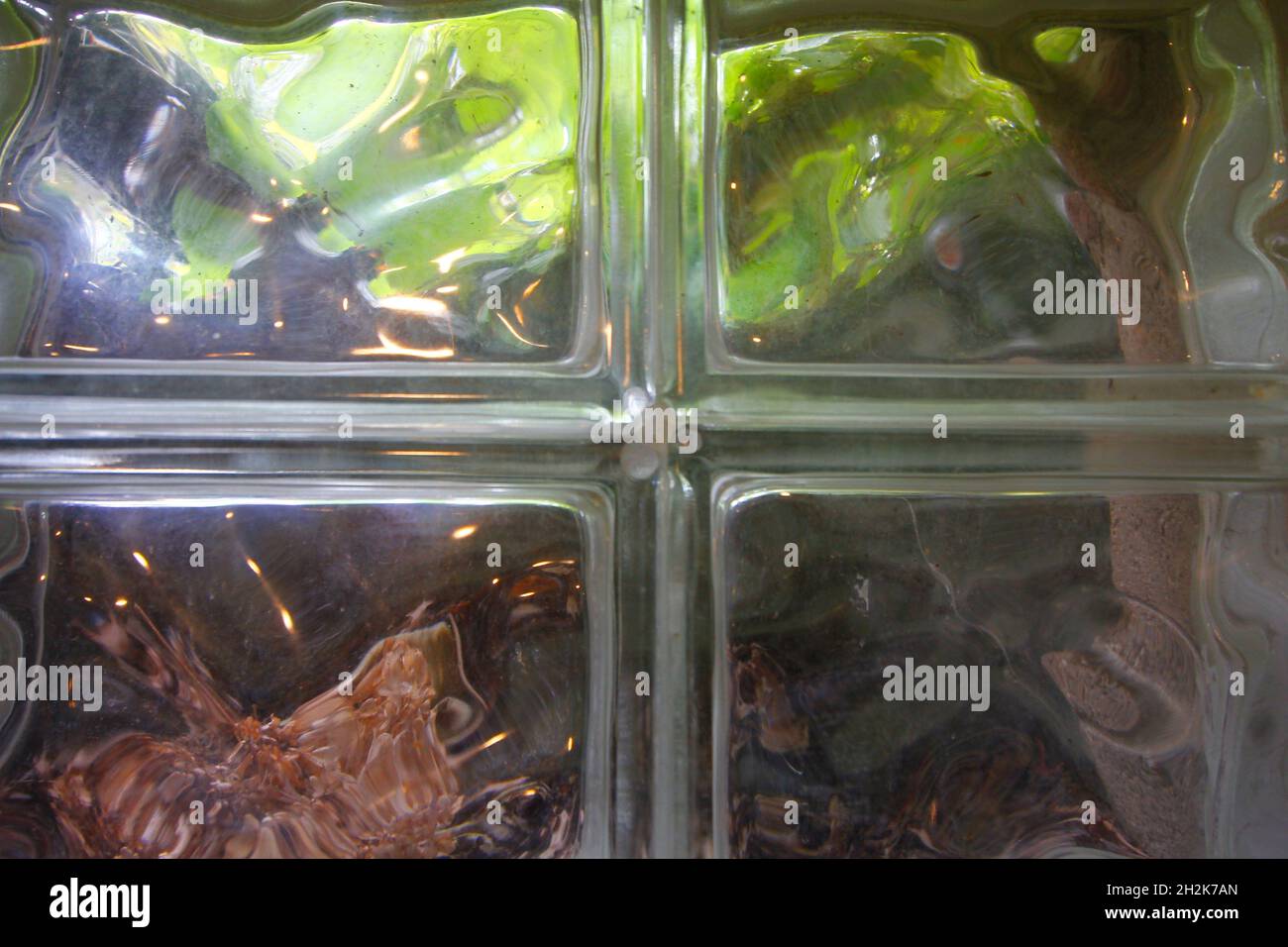 Glass block window in a basement Stock Photo - Alamy