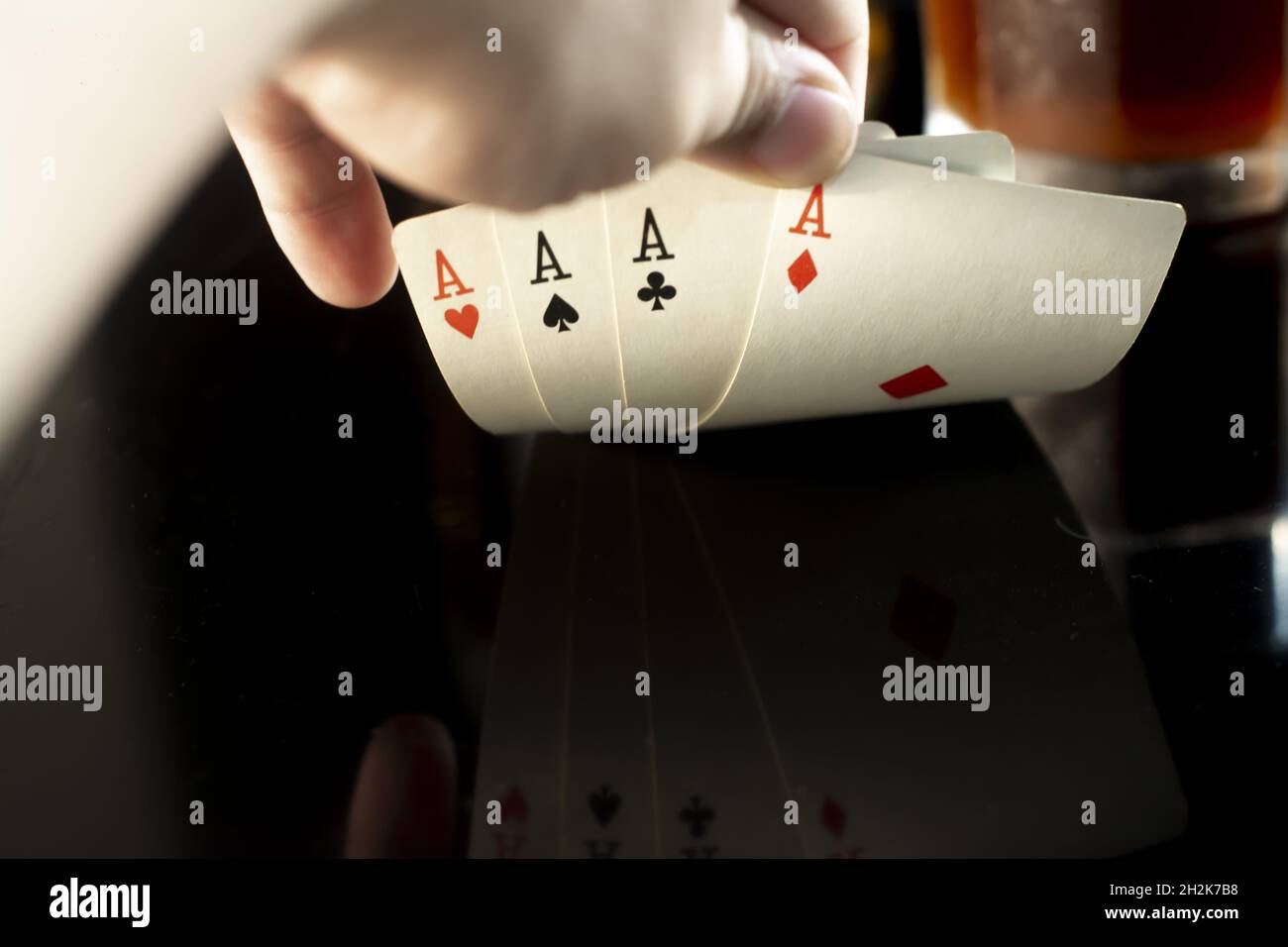 Four playing cards hi-res stock photography and images - Alamy