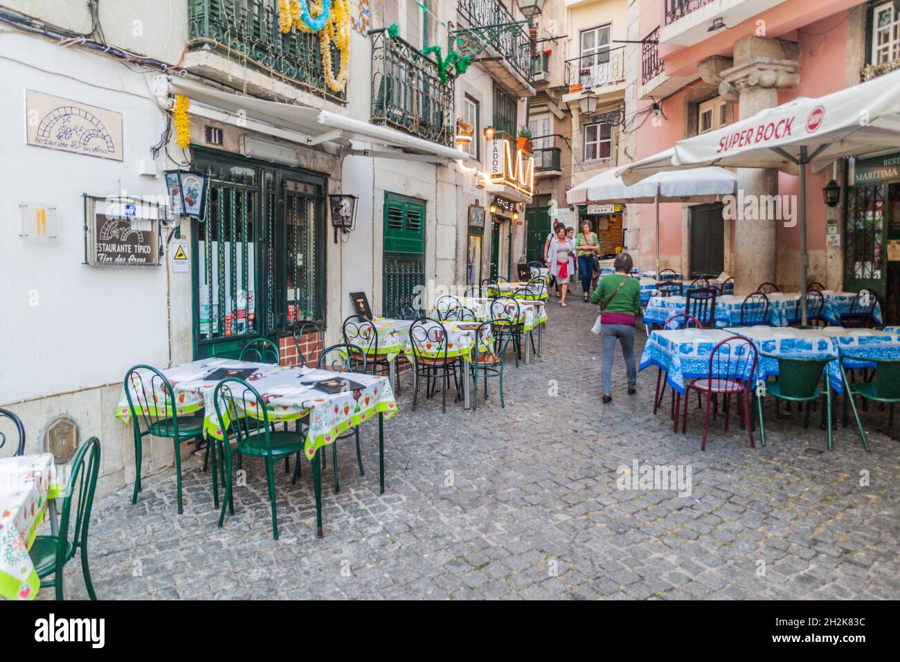 LISBON, PORTUGAL - OCTOBER 10, 2017: Open air restaurants in Alfama ...