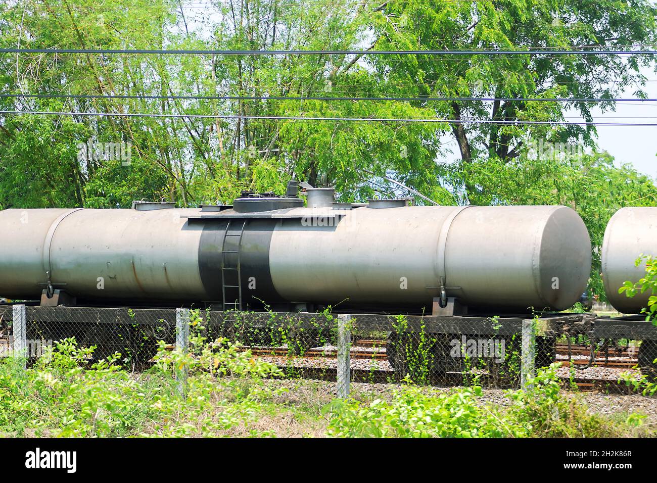 Set of tanks with oil and fuel transport by rail. Freight cars and ...