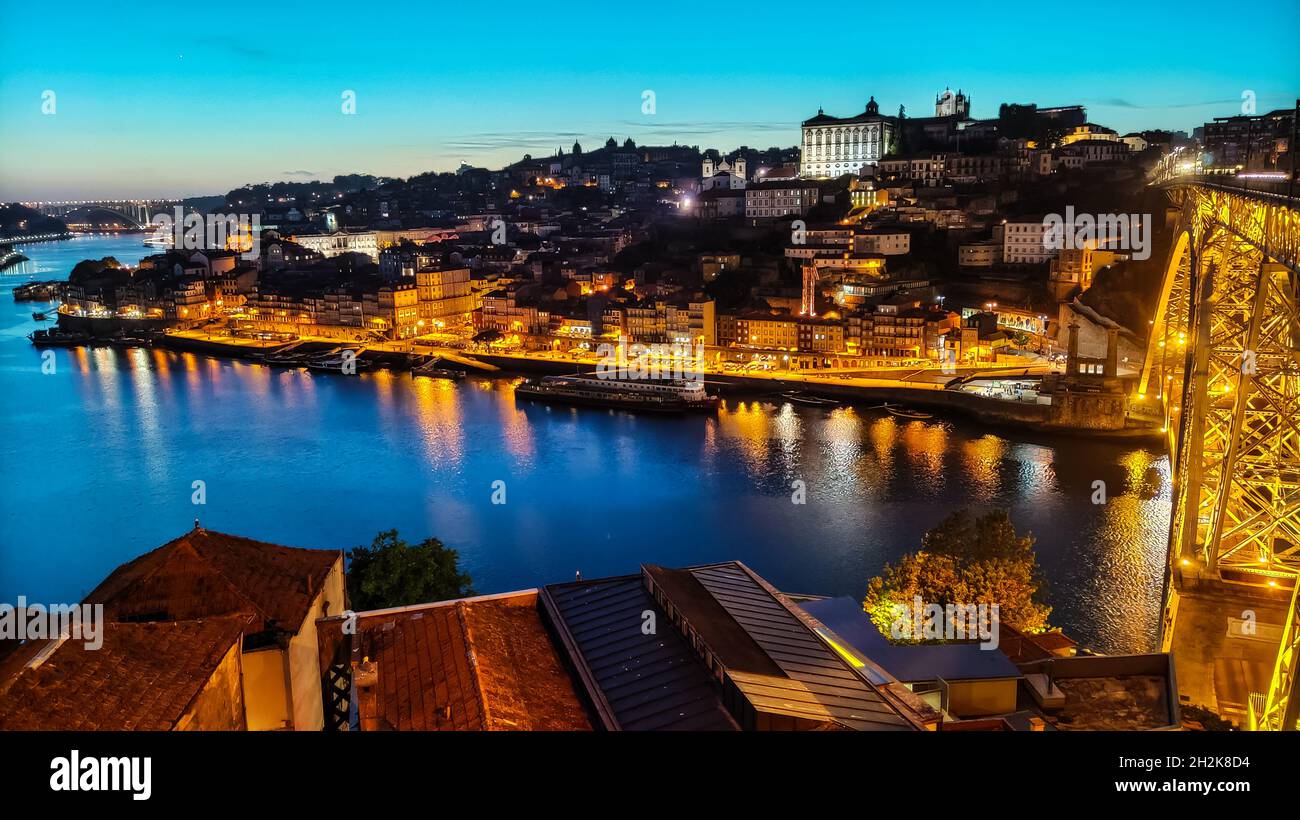 Beautiful view of the cityscape and the Louis Bridge in Porto, Portugal ...