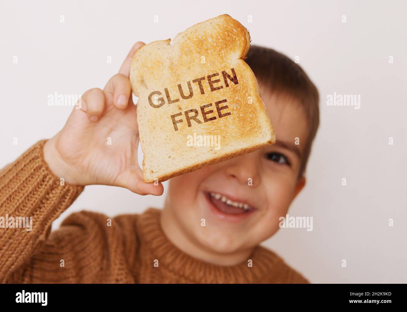 Boy hold bread hi-res stock photography and images - Alamy