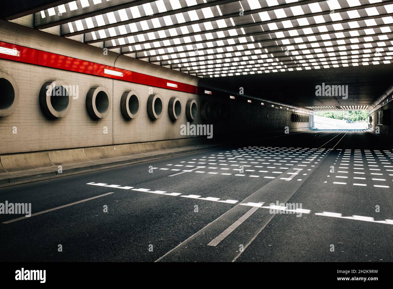 Modern tunnel with concrete walls with holes Stock Photo - Alamy