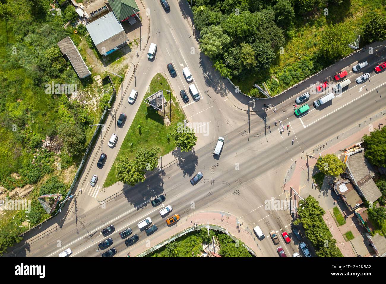 Top down aerial view of busy street intersection with moving cars traffic Stock Photo - Alamy