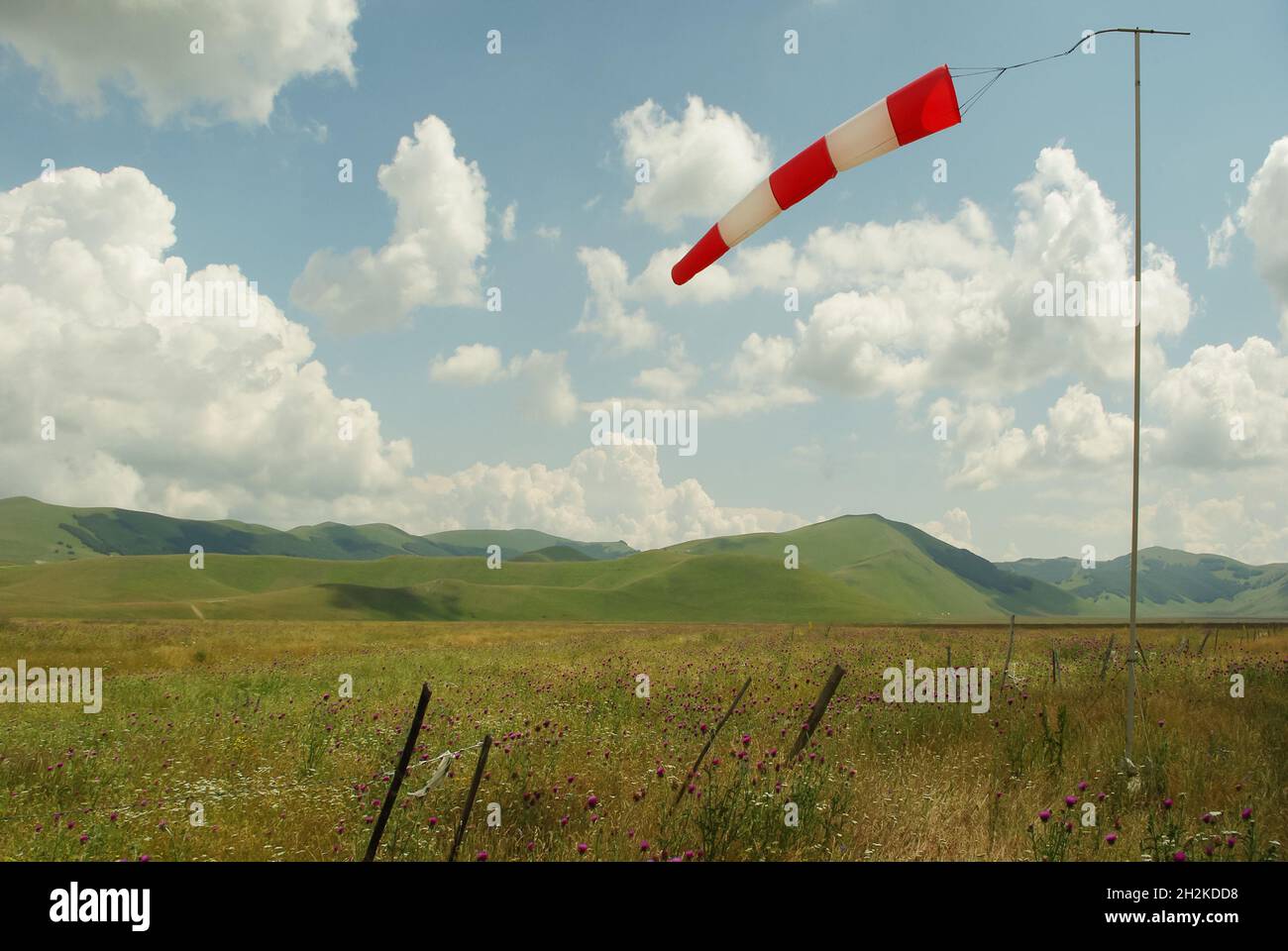 Windsock or wind indicator, red and white Stock Photo - Alamy