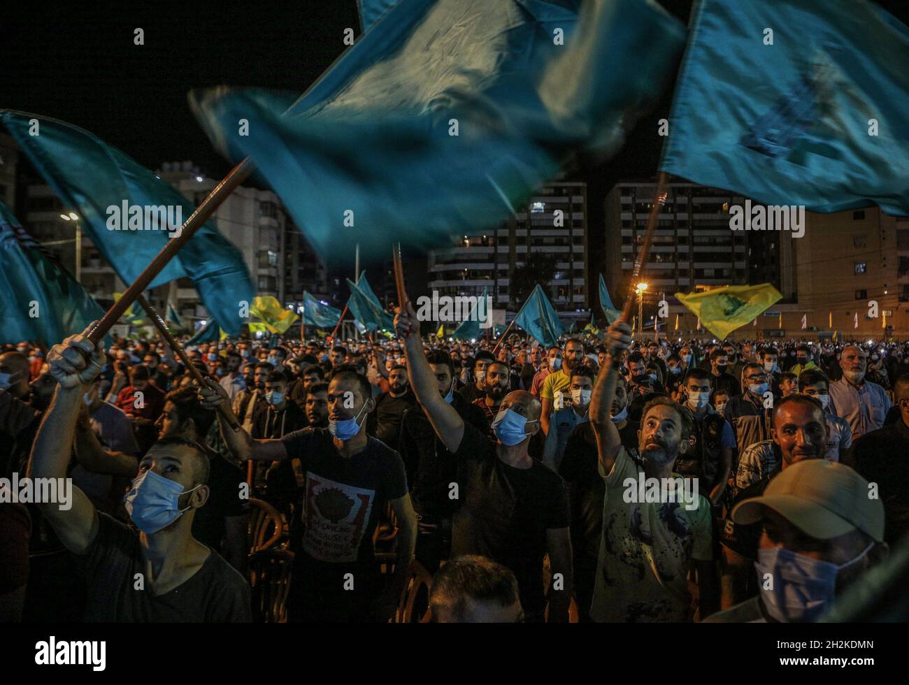 Beirut, Lebanon. 22nd Oct, 2021. Hezbollah supporters wave the movement ...