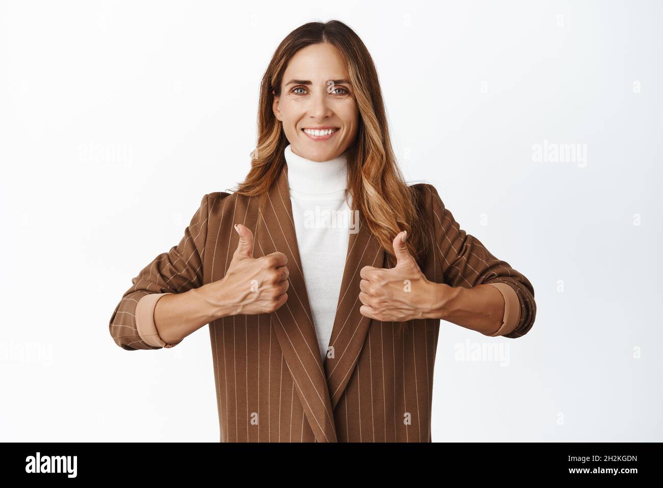 Business people. Smiling corporate woman showing thumbs up and looking ...
