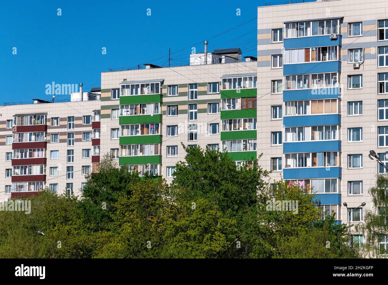 Facade of a modern multi-storey residential building with colored ...