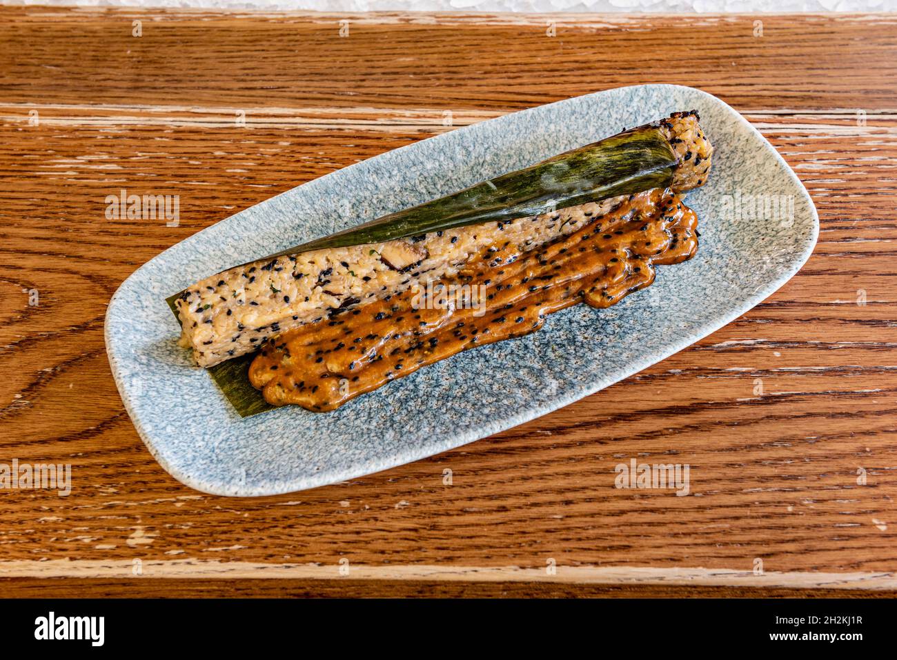 delicious recipe for rice with spices, sauce and poppy seeds on banana ...