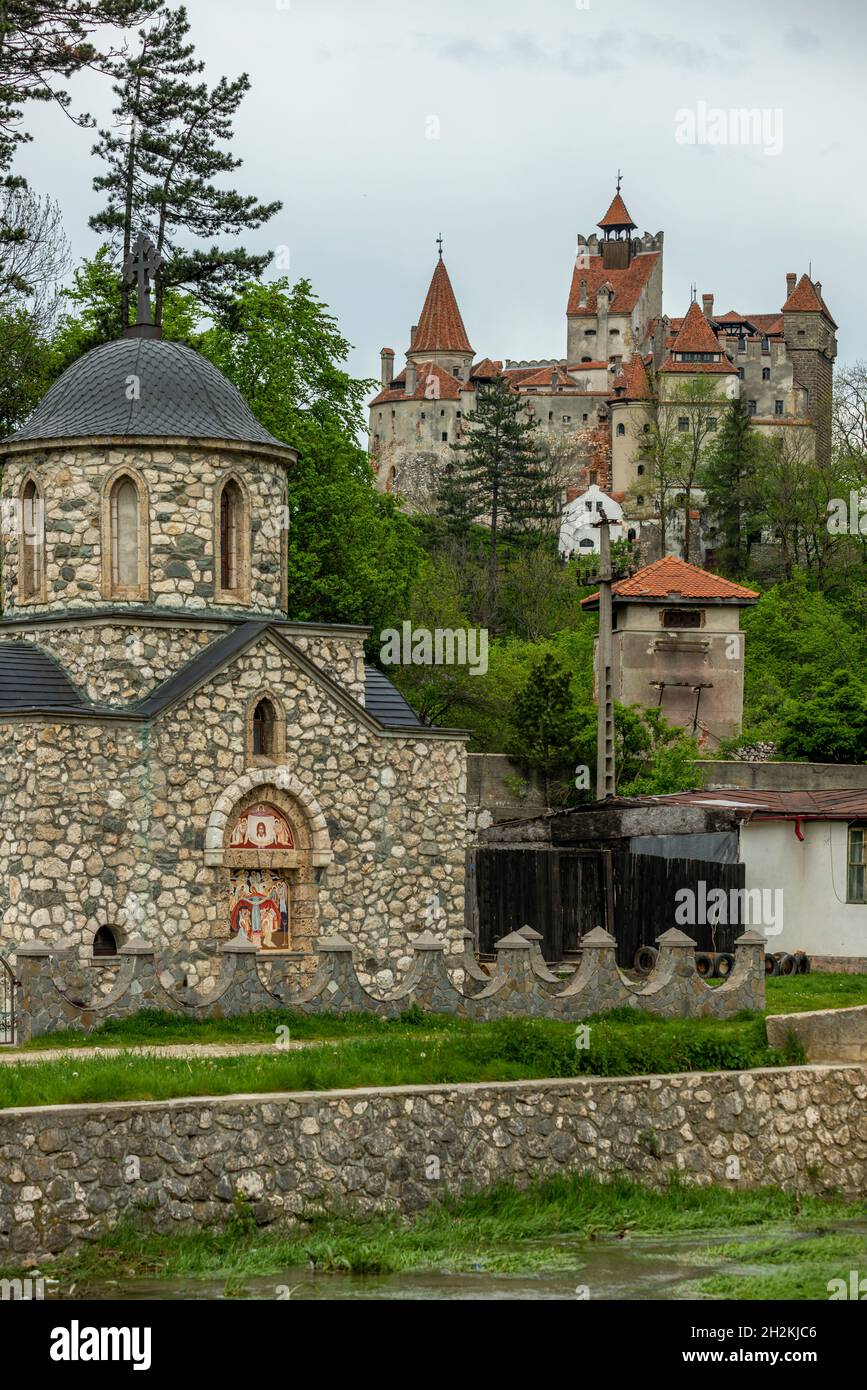 Stone orthodox church near Bran Castle among the Transylvanian forests ...