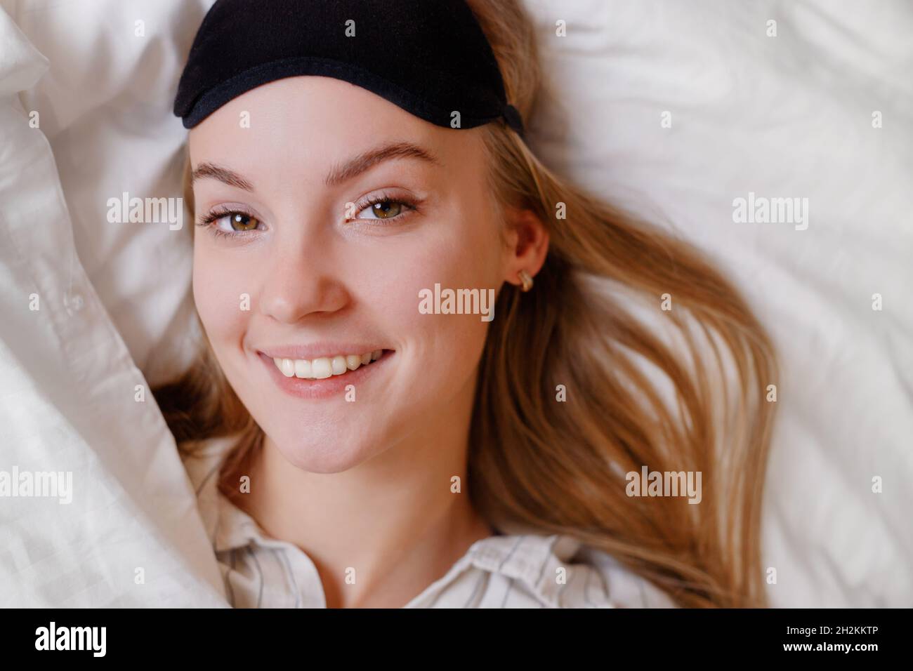 Happy woman waking up after good sleeping in bedroom Stock Photo - Alamy