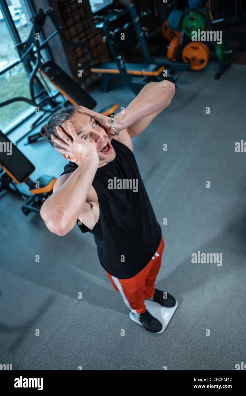 Fat man gym hi-res stock photography and images - Alamy