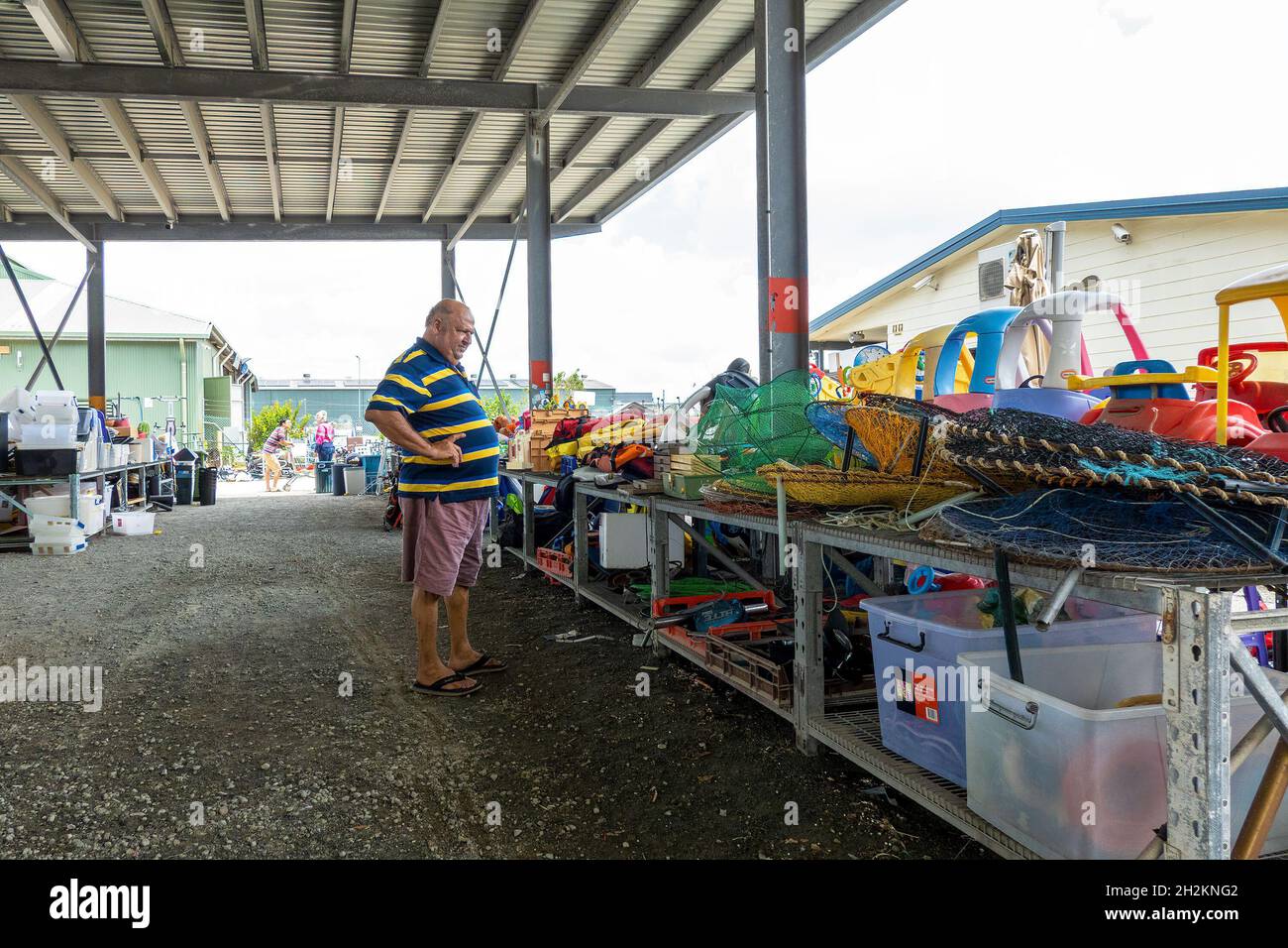 Mackay, Queensland, Australia - October 2021: Overweight man looks at ...