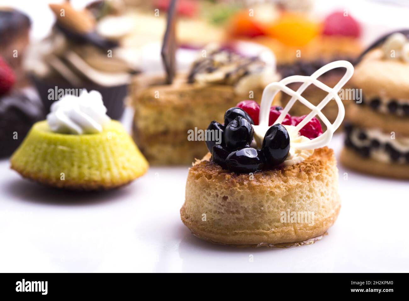 Sweet canapes on a white table Stock Photo - Alamy
