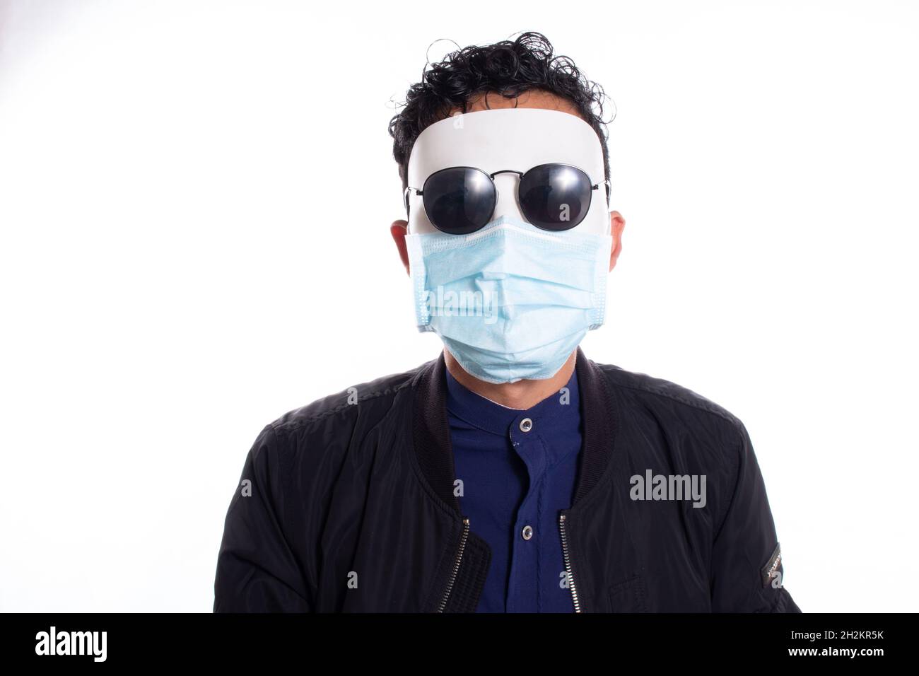 Man in disguise without expression and with face mask of a doctor ...