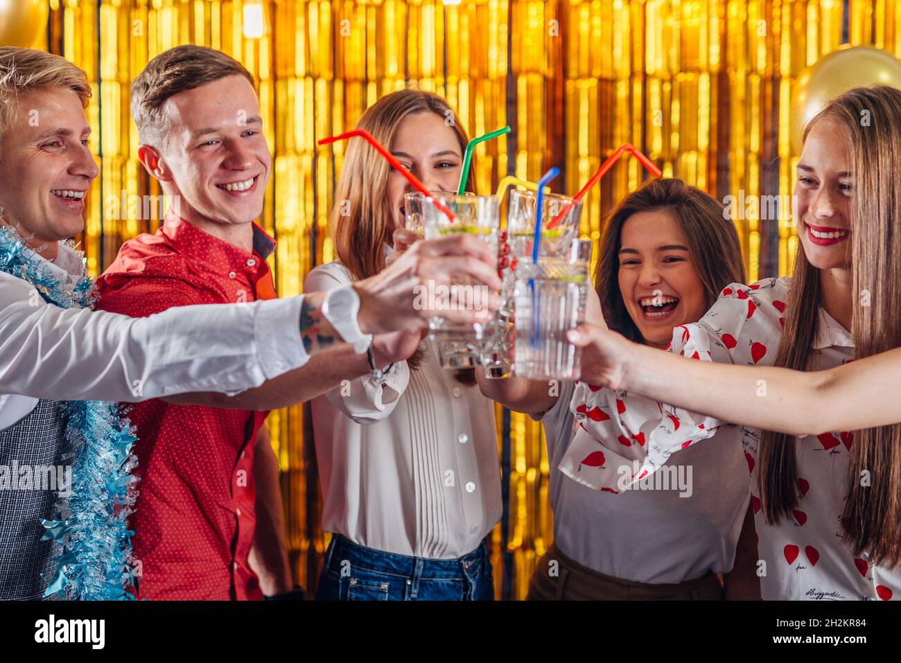 Group of friends toasting, cheering with champagne Stock Photo - Alamy