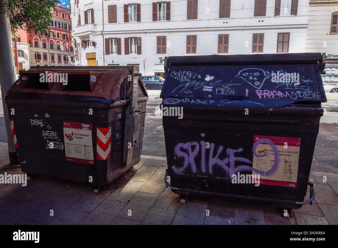 Rome, Italy garbage bins next to a road. Big dumpsters used for trash ...