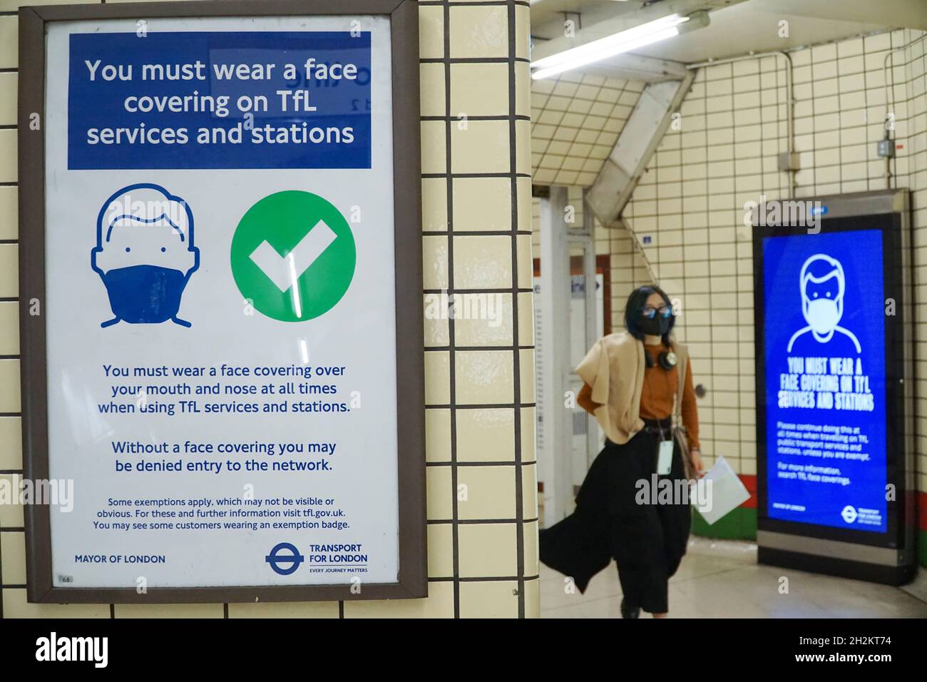 London, UK, 22 October 2021: Posters in the London Underground instruct ...