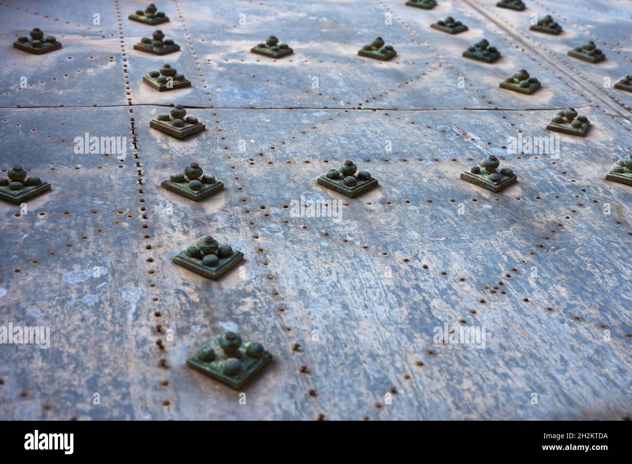 detail of some studs or rivets on an old church door Stock Photo - Alamy