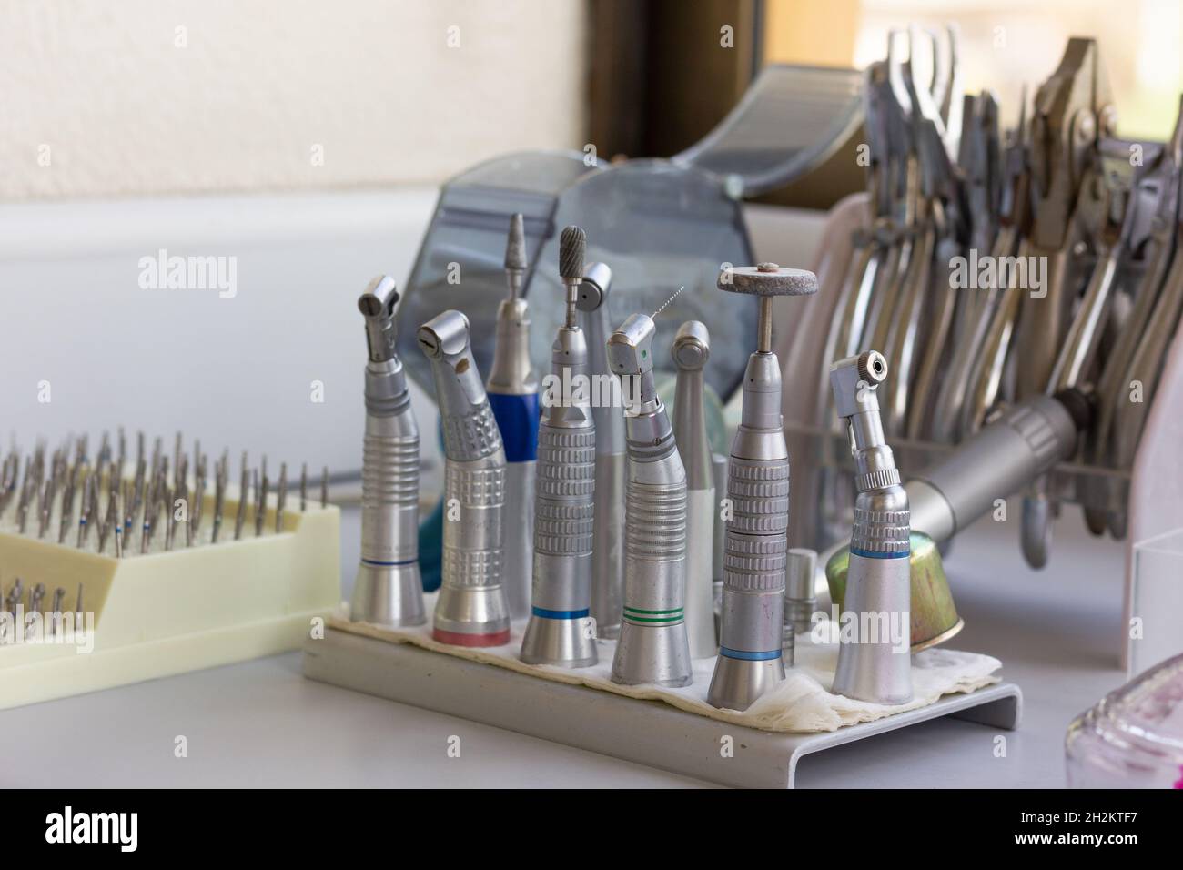 Dental clinic equipment on table. Dentist metal set of tools, oral care ...