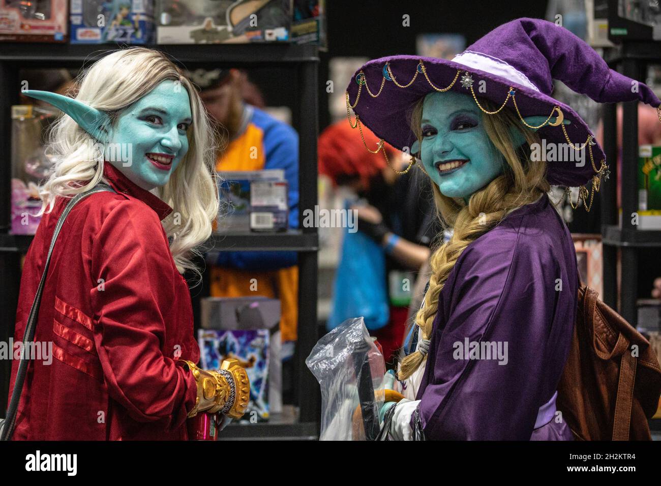 ExCel, London, UK. 22nd Oct, 2021. Two elves at one of the show booths ...