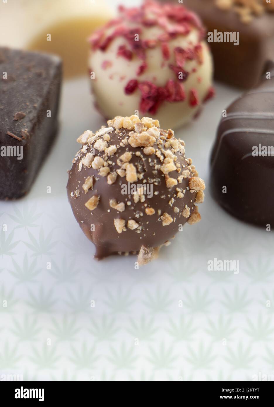 Cannabis infused chocolates, conceptual image Stock Photo - Alamy