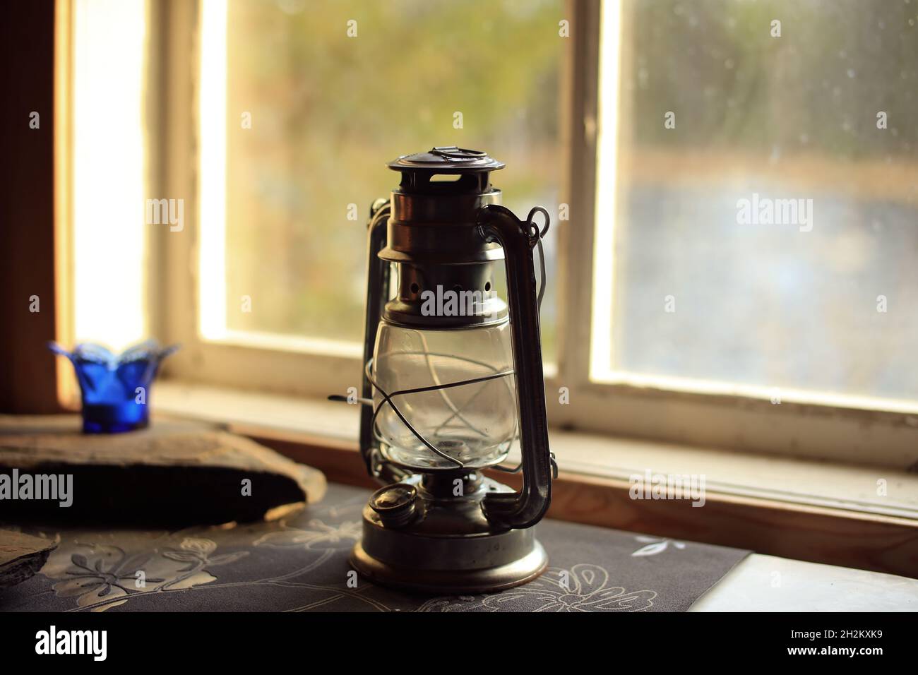 Close up of an oil lamp at the window Stock Photo - Alamy