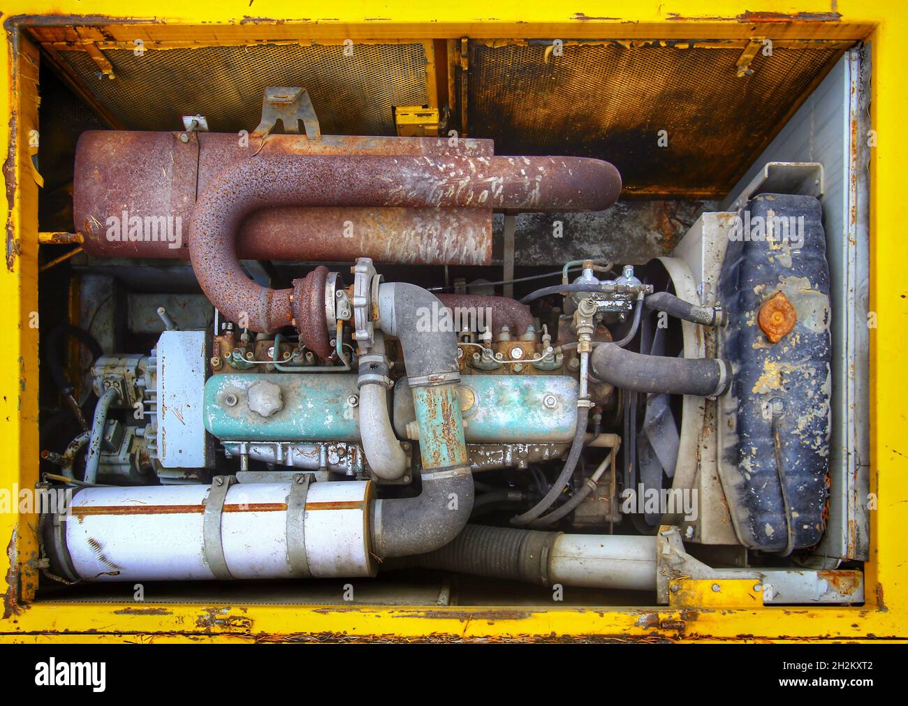 Engine bay of an old and rusty excavator Stock Photo - Alamy