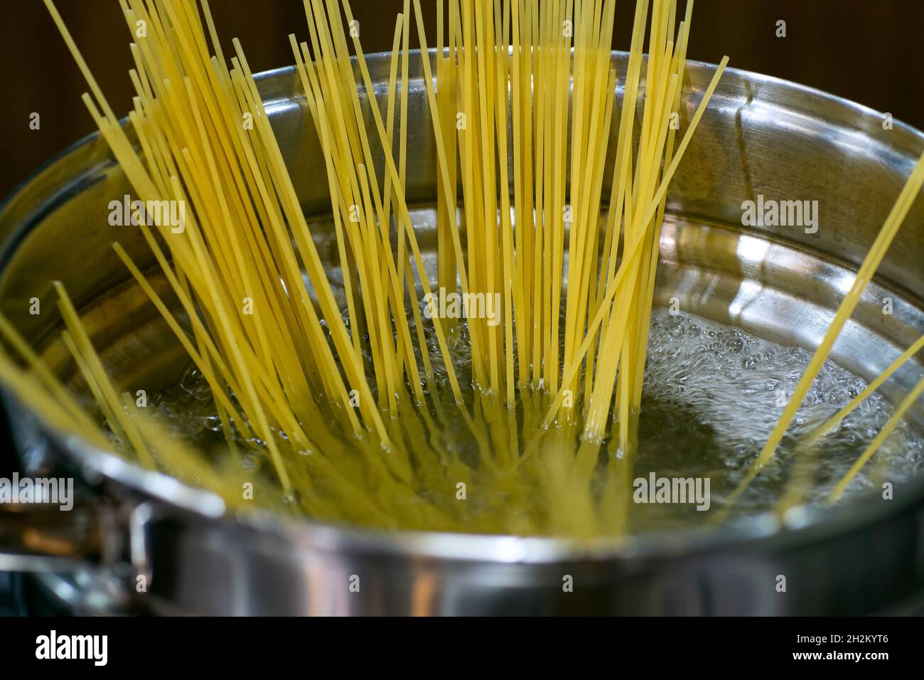 Spaghetti cooked in boiling water Stock Photo - Alamy